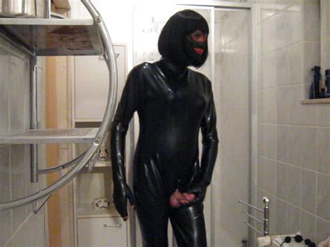 Gummiladyj in Latex with Mask and Makeup! - aShemaletube.com
