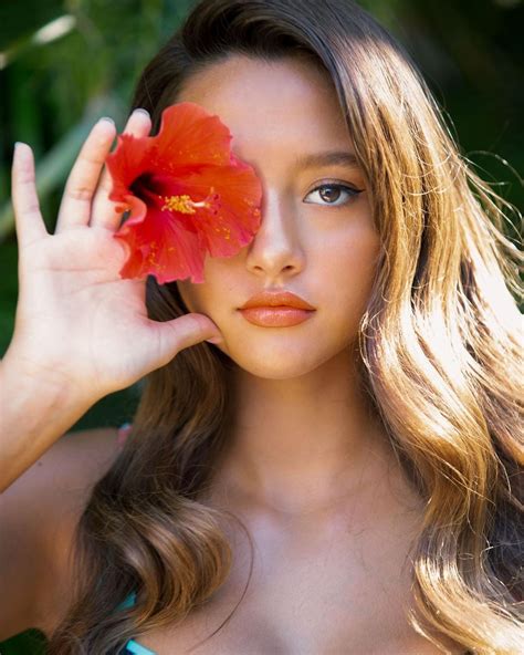 Amazing Anabel and red flower : r/Sophisticated_Beauty