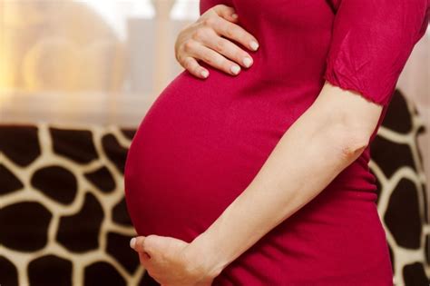 Premium Photo | Pregnant woman belly in third trimester baby ...