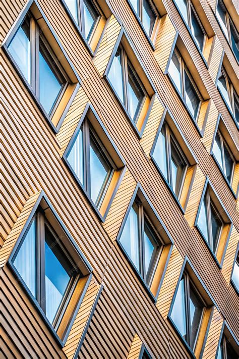 Abstract diagonal building facade with windows and siding background ...