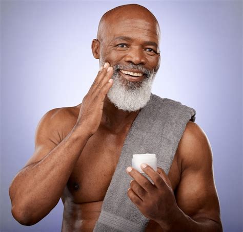Premium Photo | Skincare beauty cream and black man studio portrait ...