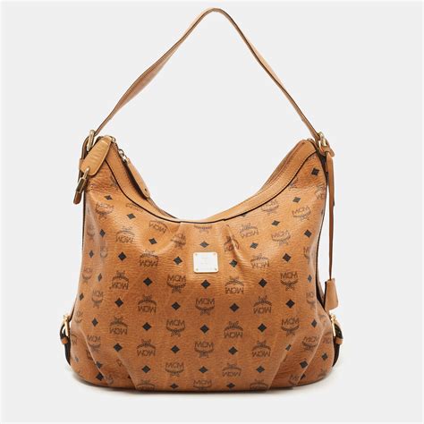 MCM Cognac Visetos Coated Canvas and Leather Hobo MCM | The Luxury Closet