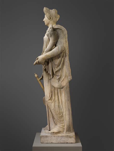 Marble statue of Tyche-Fortuna restored with the portrait head of a ...