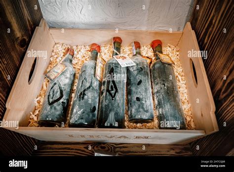 21 May 2021, Ijevan, Armenia: Covered with dense dust old bottles of ...