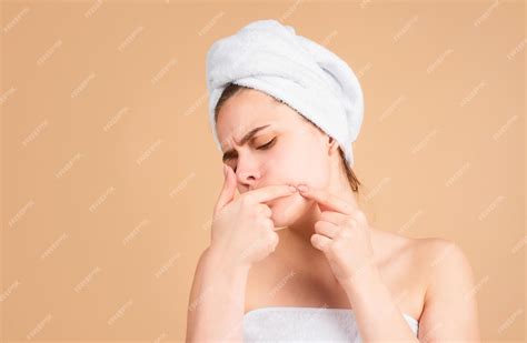Premium Photo | Woman squeezing pimples on her face acne blemish spots skin on young girl spot ...