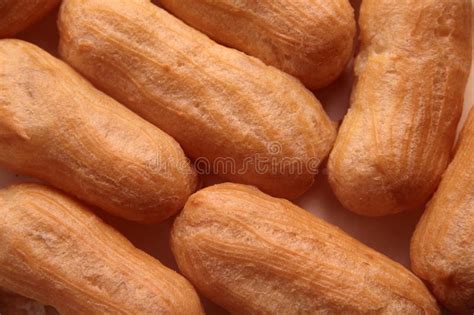 Длинные раковины Eclair строк Конфетная бумага Eclairs Процесс делать ...