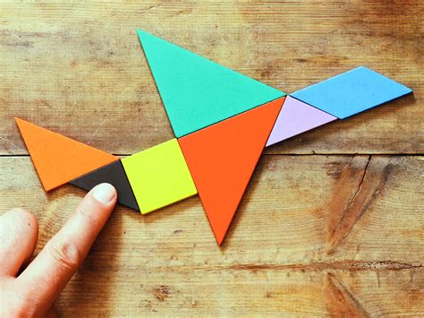 Triângulo Com 4 Peças Do Tangram