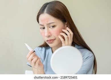 Dermatology Asian Young Woman Looking Mirror Stock Photo 2189725601 | Shutterstock