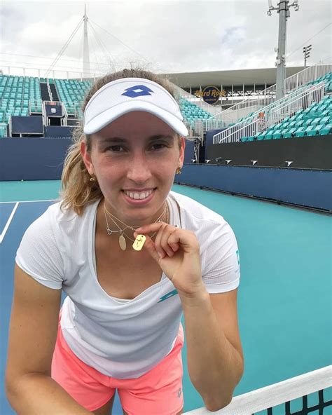 Download Elise Mertens Showing Her Pendant Wallpaper | Wallpapers.com