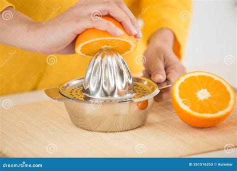 Hands Squeezing Juice Orange Stock Image - Image of liquid, fruit: 261516353