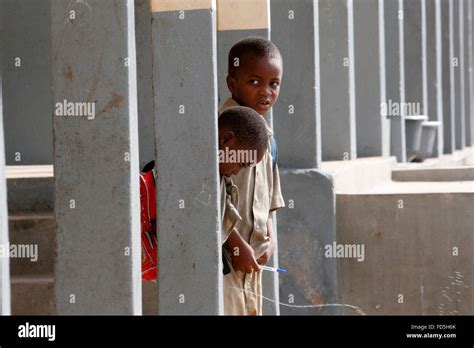 African primary school. Playground. Child peeing Stock Photo - Alamy