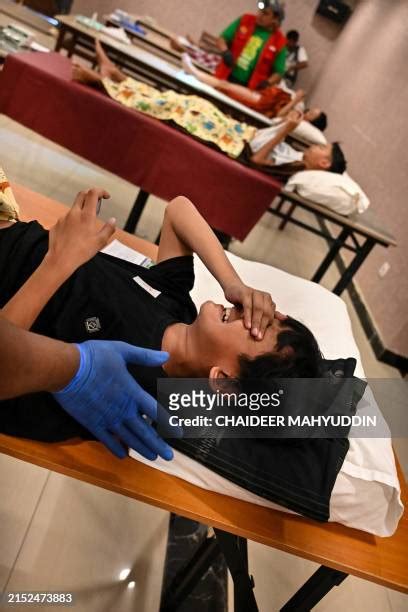 Mass Circumcision In Malaysia Photos and Premium High Res Pictures - Getty Images