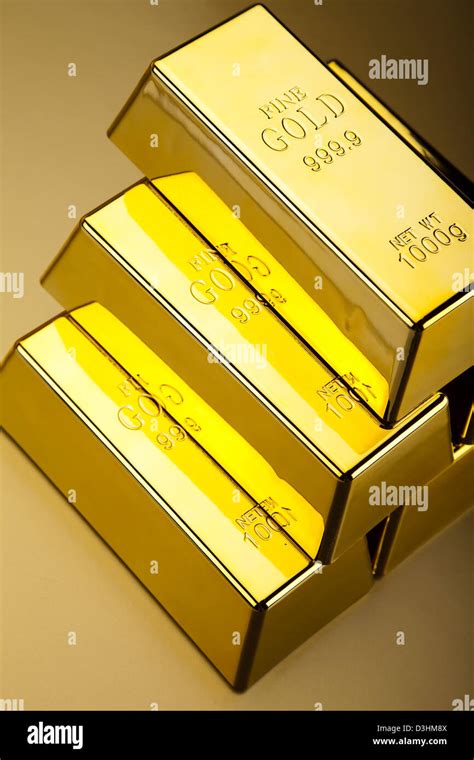 Pyramid from Golden Bars Stock Photo - Alamy