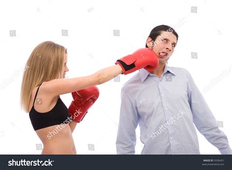Young Girl Punching A Man On White Background Stock Photo 9336451 ...