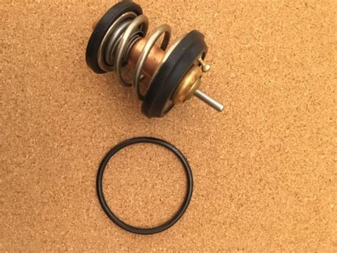 Volkswagen and Audi coolant thermostat 06H 121 113B | Engine, Engine ...